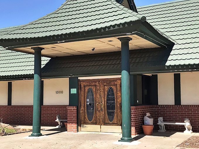 The unassuming green-roofed exterior of Golden Palace might not stop traffic, but locals know this modest facade hides a treasure trove of deliciousness inside.