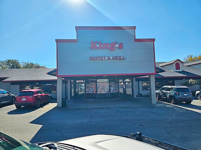 The unassuming exterior of King's Buffet & Grill hides a culinary wonderland within—like finding Narnia in a strip mall.