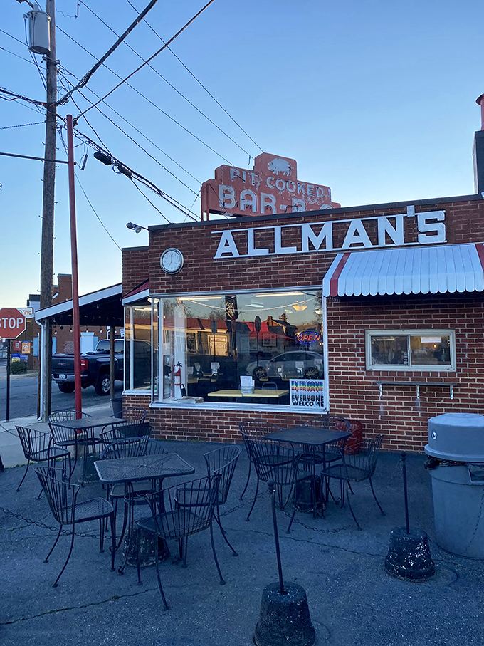 The iconic brick exterior and vintage sign at Allman's have been beckoning hungry travelers since Eisenhower was signing bills. BBQ pilgrimage starts here.