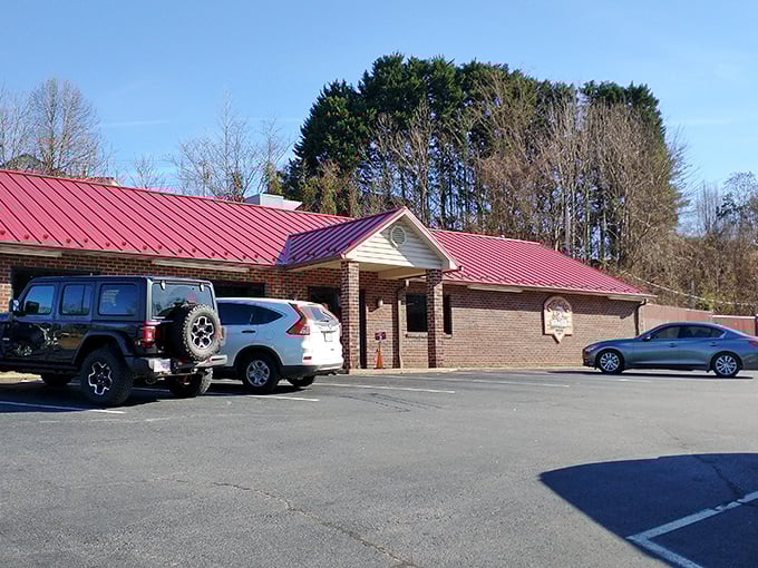 The unassuming brick exterior with its bright red roof is like that quiet kid in school who turns out to be a genius. Barbecue brilliance awaits inside.
