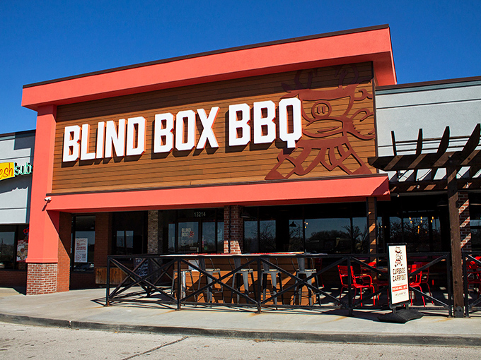 The bright orange facade of Blind Box BBQ stands out like a beacon for hungry barbecue pilgrims. No smoke signals needed&mdash;you can smell the goodness from the parking lot.