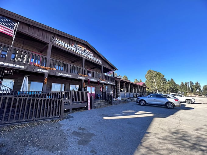 The wooden facade of Mad Jack's stands like a barbecue beacon in the mountains, promising smoky treasures within those rustic walls.
