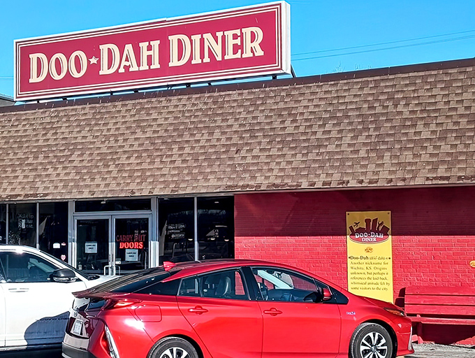 The red exterior of Doo-Dah Diner stands like a beacon of breakfast hope in Wichita. No fancy frills, just the promise of comfort food glory within.
