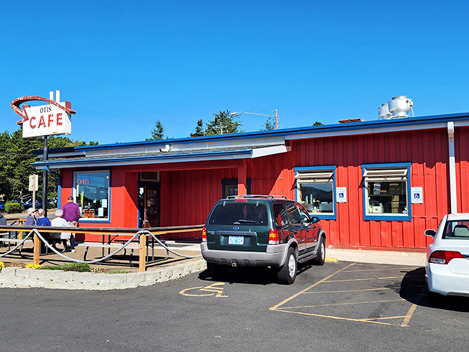The iconic red exterior and vintage neon sign of Otis Cafe stands like a beacon for hungry travelers. This roadside gem has been calling breakfast pilgrims to Highway 18 for generations.