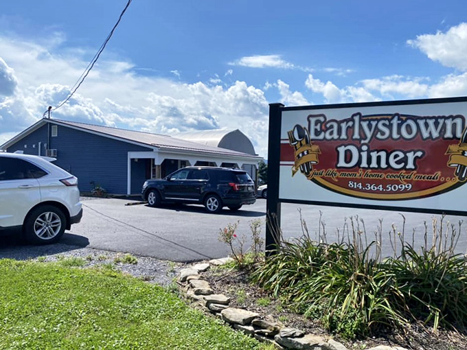The unassuming exterior of Earlystown Diner belies the culinary treasures within. Those hanging purple petunias aren't just for show&mdash;they're your first clue that someone here cares about details.