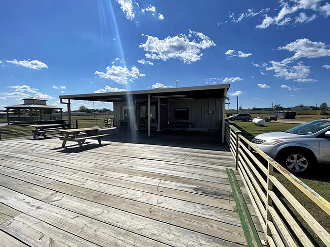 
Inside, red-checkered tablecloths and Coca-Cola memorabilia create that perfect "I've just walked into someone's oversized kitchen" feeling that promises authentic comfort.