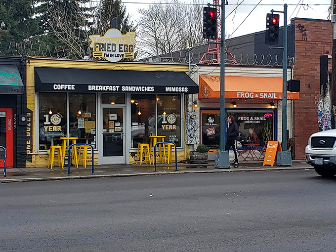 The bright yellow guitar-shaped egg sign beckons breakfast enthusiasts like a rock concert for your taste buds. Portland's breakfast scene at its finest.