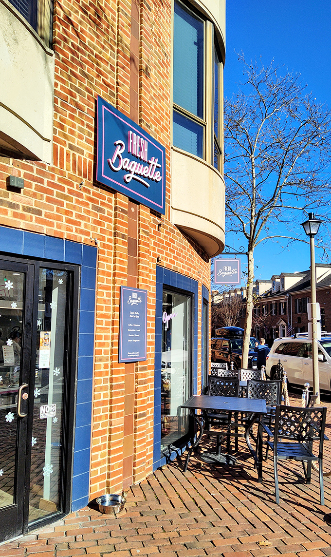 Fresh Baguette's charming brick exterior with blue trim feels like stumbling upon a secret Parisian caf&eacute; tucked away in Alexandria's historic streets.