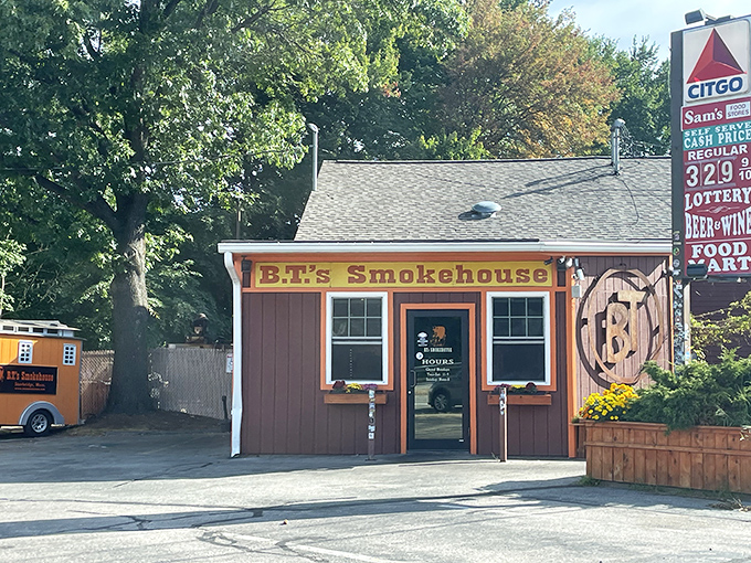 The unassuming red exterior of B.T.'s Smokehouse belies the flavor explosion waiting inside. Like finding a Ferrari engine in a farm truck.