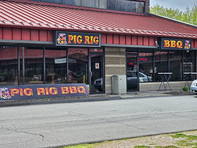 The unassuming exterior of Pig Rig BBQ in Wallingford hides a smoky paradise within. Like finding a diamond in the rough, but the diamond is brisket.