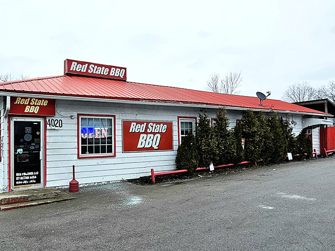 The unassuming white building with bold red trim stands like a beacon of barbecue hope on Georgetown Road. Smoke signals of deliciousness await inside.
