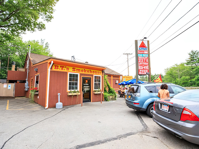 The unassuming red exterior of B.T.'s Smokehouse belies the flavor explosion waiting inside. Like finding a Ferrari engine in a farm truck.