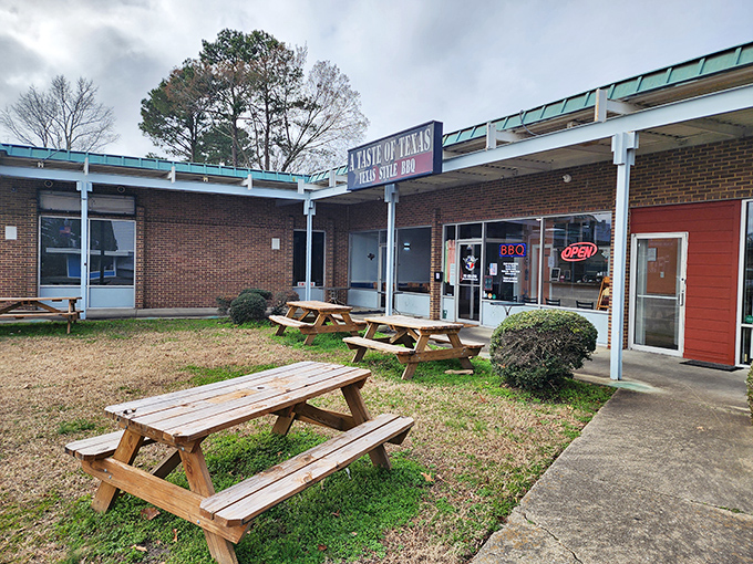 The unassuming storefront that houses barbecue magic. Like finding a diamond in a strip mall, A Taste of Texas quietly beckons hungry travelers.