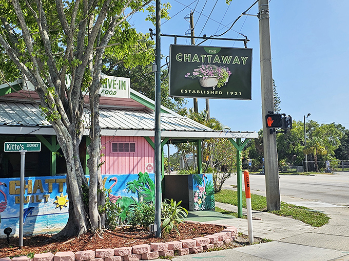 The pink facade of The Chattaway stands like a cheerful time capsule on 4th Street South, its vintage sign proudly announcing "Established 1921" to passing motorists.