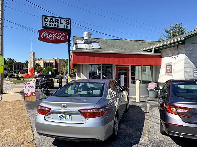 Classic Americana never goes out of style at Carl's Drive-In, where the iconic red awning has beckoned hungry travelers since 1959.