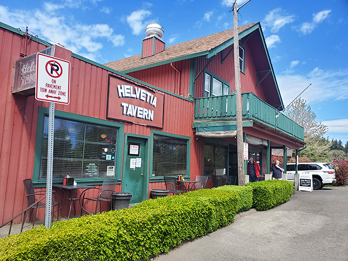 The red farmhouse-style building stands proudly against Oregon's blue sky, like a burger beacon calling hungry travelers home.