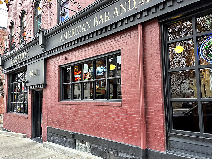 The unassuming pink brick exterior of Tessaro's hides culinary greatness like a superhero's secret identity. Pittsburgh's burger temple awaits.