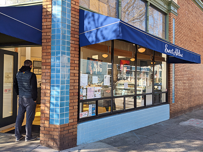 The unassuming blue awning of Sweet Adeline Bakeshop beckons from Berkeley's Adeline Street like a secret whispered among friends who appreciate exceptional baked goods.