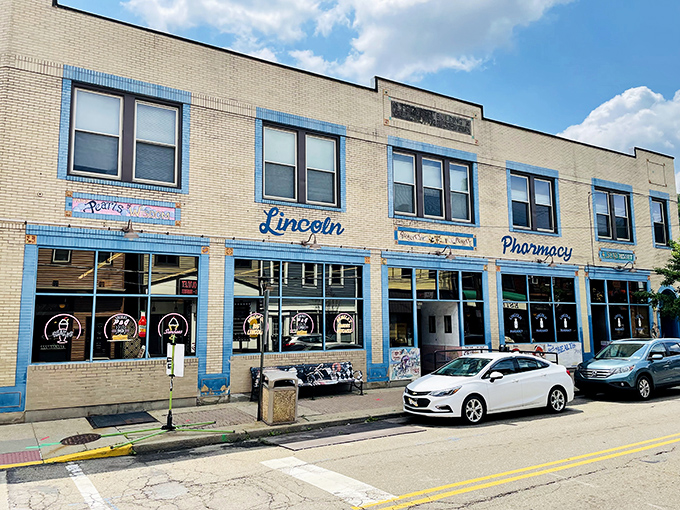 The iconic blue facade of Lincoln's P&G stands as a Pittsburgh landmark, where pharmacy meets diner in a marriage that somehow makes perfect sense.