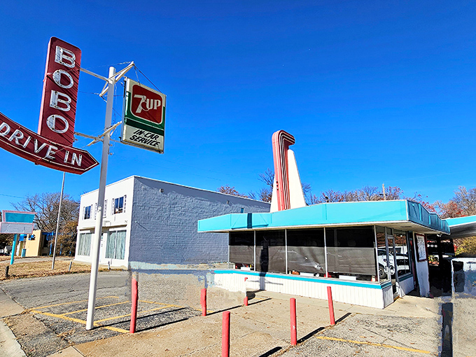 The white exterior of Bobo's stands like a beacon of mid-century nostalgia, promising comfort food that's remained unchanged since Eisenhower was in office.