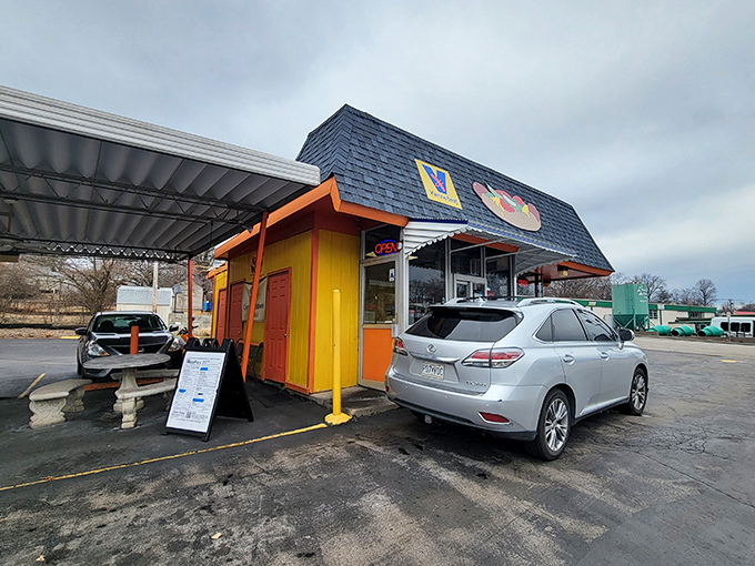 The sunshine-yellow exterior of Woofie's isn't just a building&mdash;it's a beacon of hope for the hot dog deprived. "Serving the hot dog with dignity" isn't just a slogan, it's a mission statement.