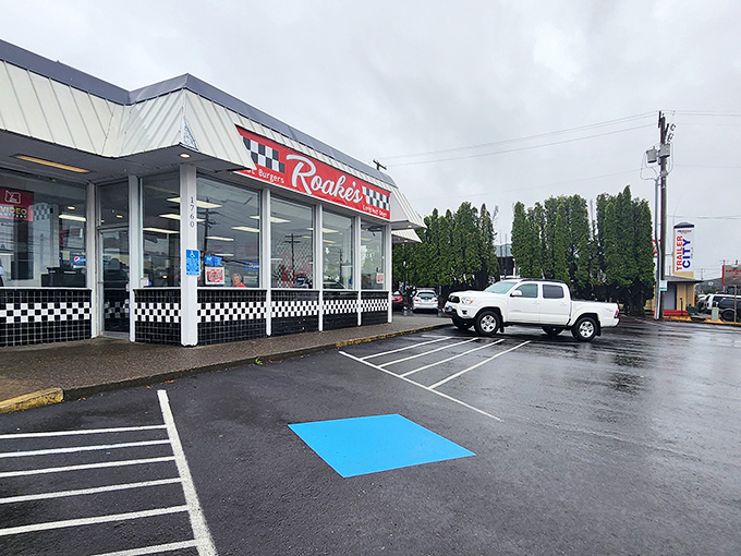 The unassuming exterior of Roake's stands like a time capsule on Columbia Boulevard, promising simple pleasures that fancy restaurants often forget.