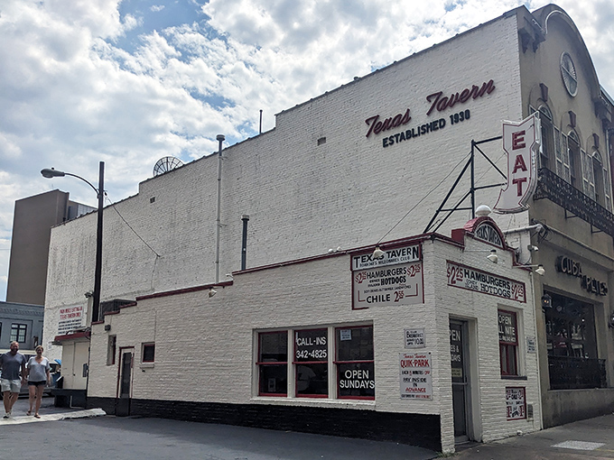 The iconic white brick exterior of Texas Tavern stands like a time capsule in downtown Roanoke, promising affordable eats and endless stories.