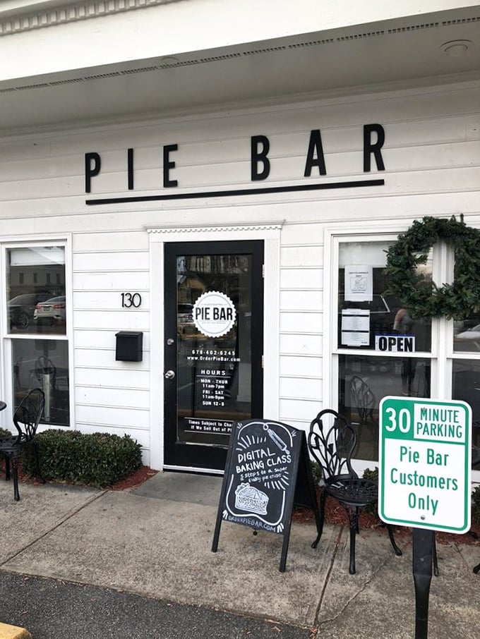 The simple white facade of Pie Bar beckons like a whisper among Woodstock's historic buildings &ndash; pie paradise awaits inside.