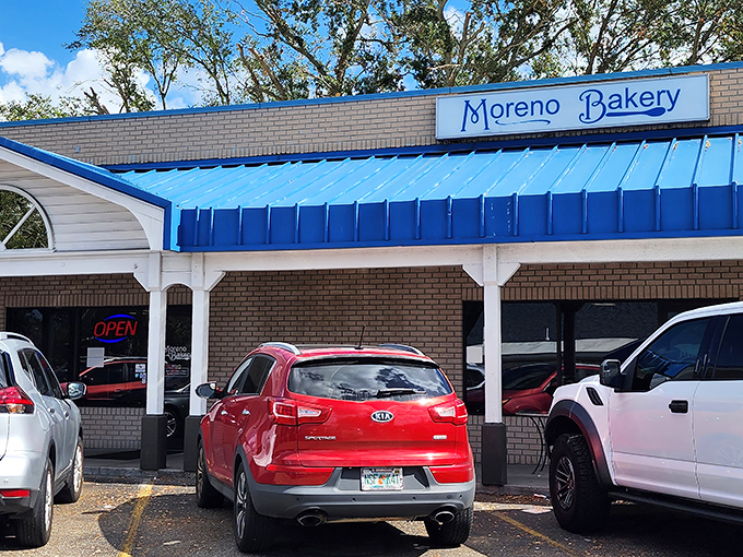 The unassuming blue awning of Moreno Bakery hides culinary treasures that would make a food detective's heart race. Florida's best-kept secret sits quietly in plain sight.