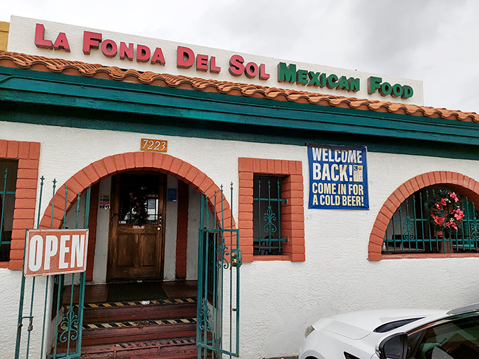 The unassuming entrance to flavor paradise. La Fonda Del Sol's charming exterior promises authentic Mexican cuisine behind those welcoming doors.
