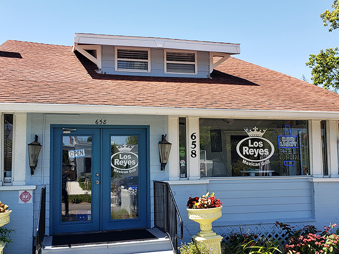 A blue cottage with palm trees and picnic tables that looks more like your favorite aunt's beach house than a restaurant. Culinary surprises hide in plain sight.