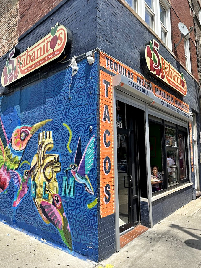The psychedelic mural and blue facade of 5 Rabanitos stands out on 18th Street like a delicious beacon, promising authentic Mexican flavors.