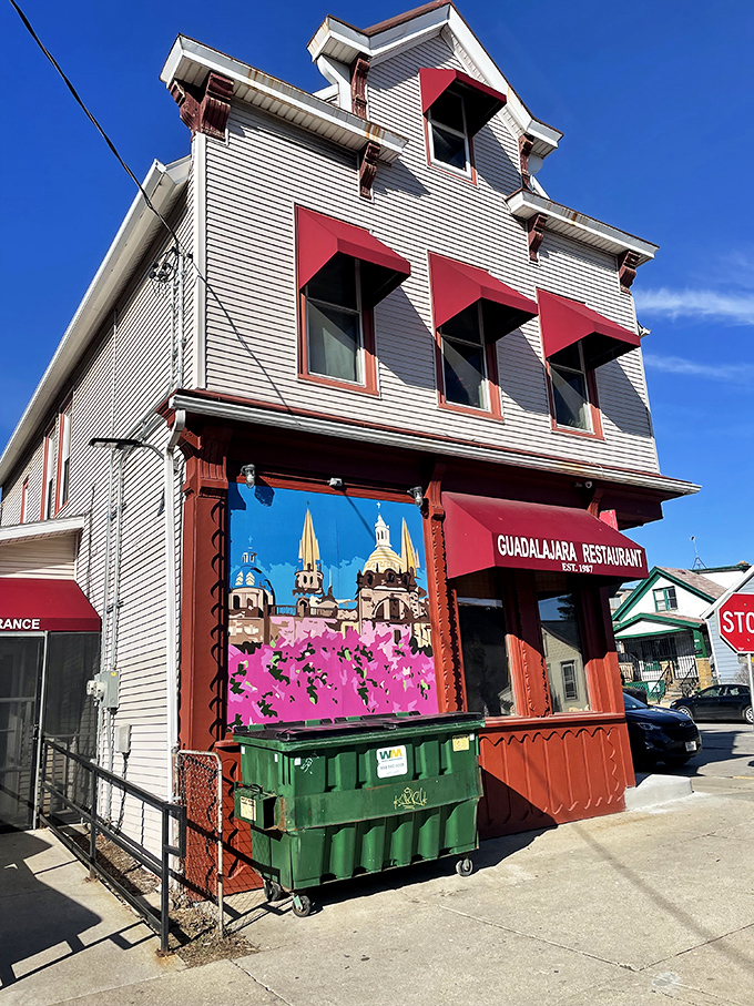 Guadalajara Restaurant's unassuming white exterior with bold red awnings stands like Milwaukee's best-kept culinary secret hiding in plain sight.