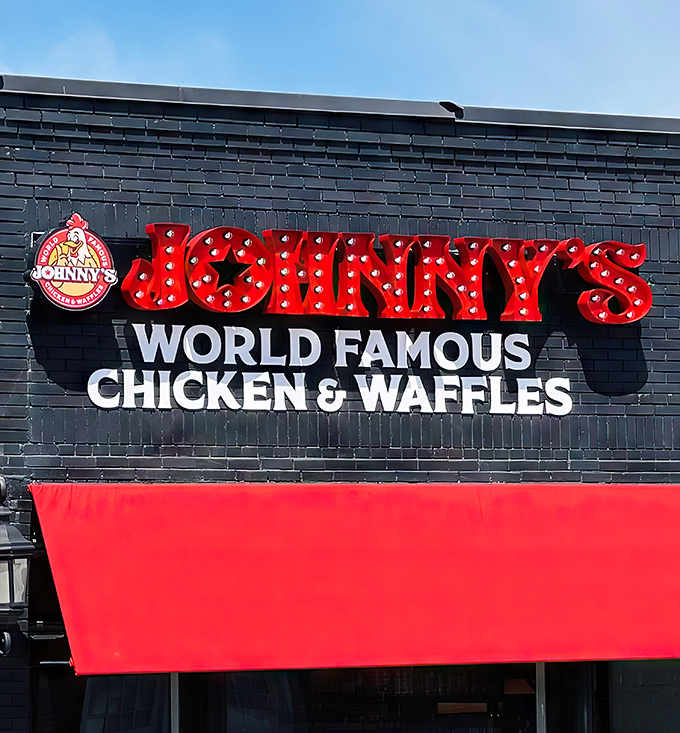 Johnny's bold red awnings and illuminated signage stand out like a beacon for hungry travelers. Southern hospitality begins at the curb.