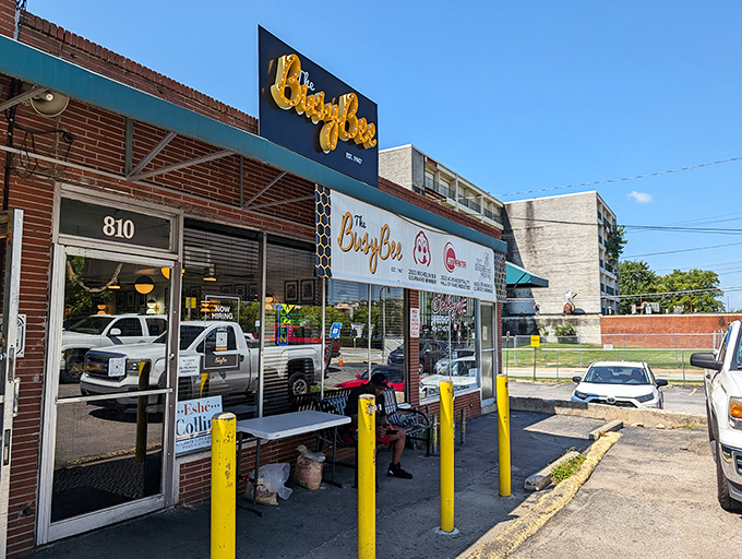 The iconic blue and yellow sign beckons hungry pilgrims like a Southern food lighthouse. The James Beard award banner confirms what locals already knew: this place is legendary.