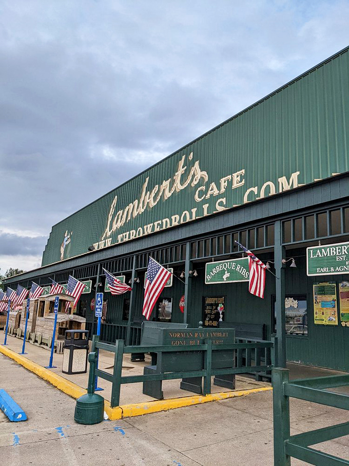 The iconic green exterior of Lambert's Caf&eacute; stands proud in Sikeston, complete with American flags and a promise of throwed rolls that's visible from the highway.