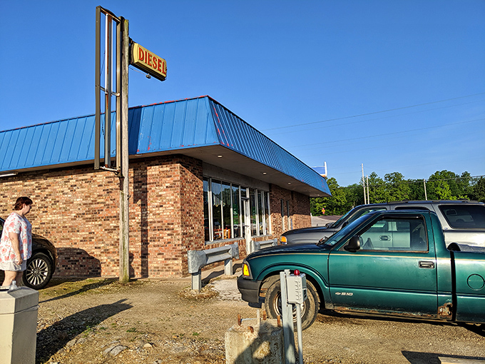 The unassuming exterior could be easily missed, but locals know better than to judge this culinary treasure by its modest brick-and-blue-roof cover.