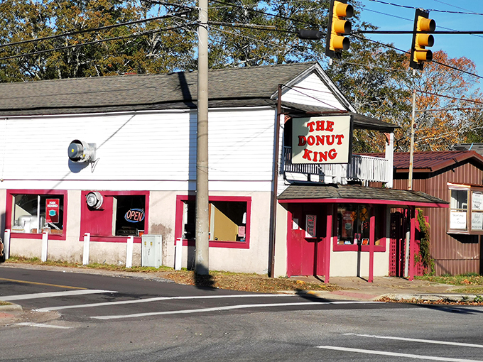 The unassuming white building with red trim might not look like much, but inside awaits donut nirvana that's worth every calorie.