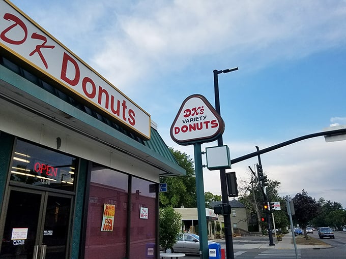 The green-roofed temple of fried dough stands like a beacon on State Street, promising sweet salvation to all who enter.