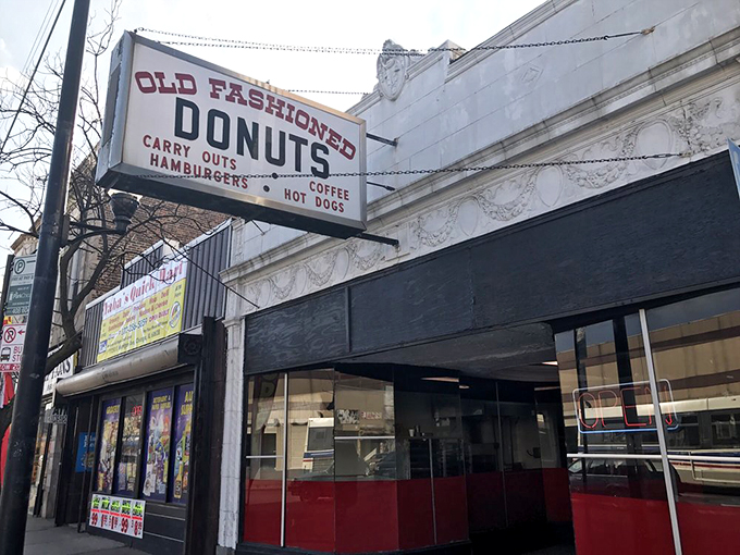 The unassuming white storefront with its vintage sign promises simple pleasures that fancy downtown bakeries can only dream of replicating.