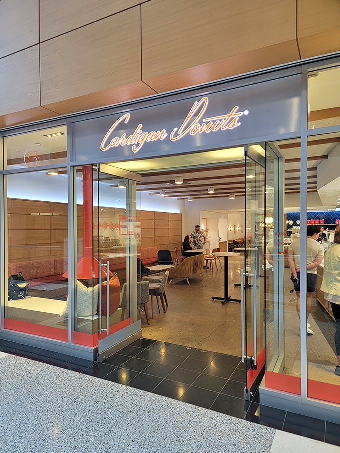The sleek storefront of Cardigan Donuts beckons from Minneapolis' City Center, promising sweet salvation from Minnesota's notorious winters.