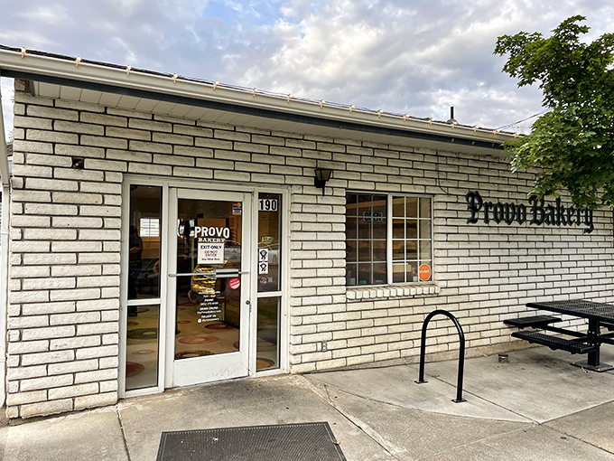 The unassuming white brick exterior of Provo Bakery hides a universe of donut perfection within. Culinary treasures often come in modest packages.
