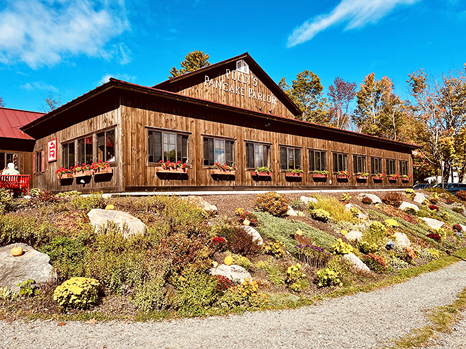The promised land of pancakes rises from the New Hampshire hillside like a timber cathedral to breakfast perfection. Polly's rustic exterior promises culinary salvation ahead.