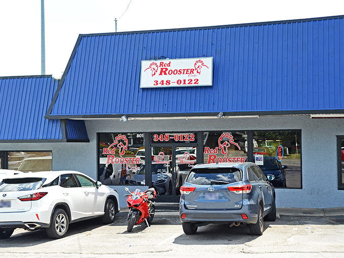 The blue-roofed beacon of breakfast bliss. Red Rooster Cafe's exterior may be humble, but those cars in the lot tell the real story.