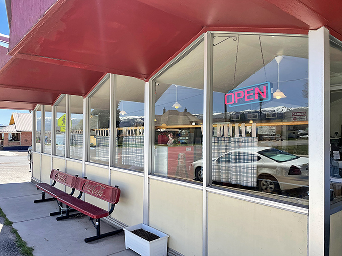 The classic red-trimmed exterior with vintage Coca-Cola bench says everything you need to know&mdash;unpretentious, welcoming, and ready to feed you properly.