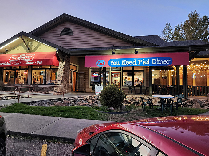 The bright red awning of You Need Pie! Diner isn't just inviting&mdash;it's making a bold statement about your immediate dietary requirements.