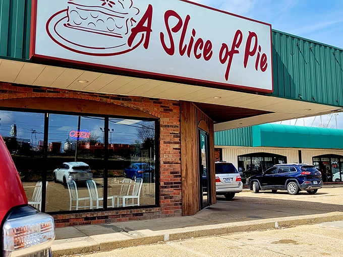 The unassuming exterior of A Slice of Pie stands like a dessert speakeasy, quietly promising treasures that make detours worthwhile. 