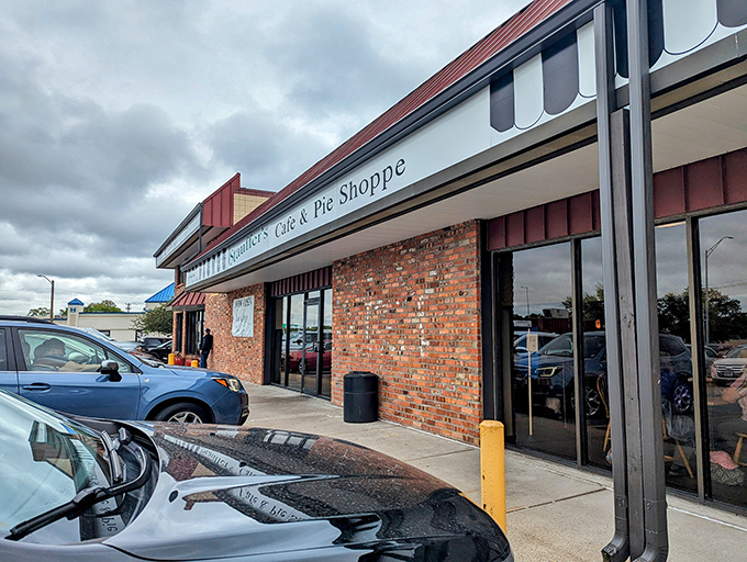 The pilgrimage begins here - a humble red-roofed brick building housing Nebraska's temple to pie perfection. Forget fancy facades; it's what's inside that counts.