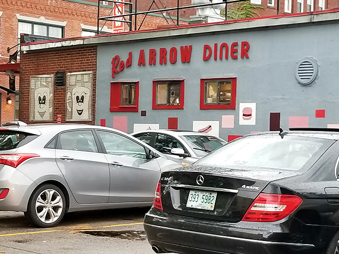 That iconic red arrow sign has been beckoning hungry travelers to this Manchester landmark since 1922, a neon North Star guiding food pilgrims home.