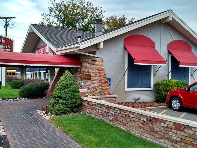 The iconic red awning beckons like a culinary lighthouse, promising comfort food salvation after a long day of Utah adventures.